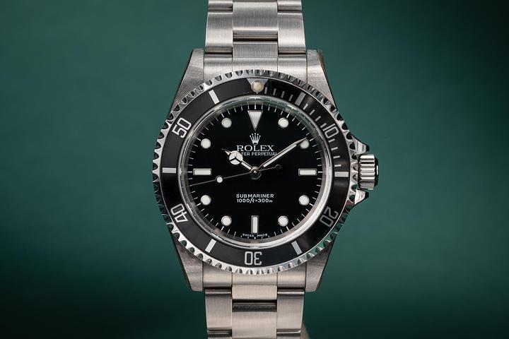 NOS 2003 Rolex Submariner 14060M with Box and Papers | Tropical Watch