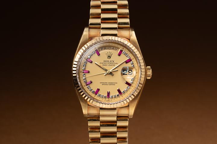 1980 Rolex 18K YG Day-Date 18038 Satin Champagne Baguette Ruby String Dial with Service Papers ...